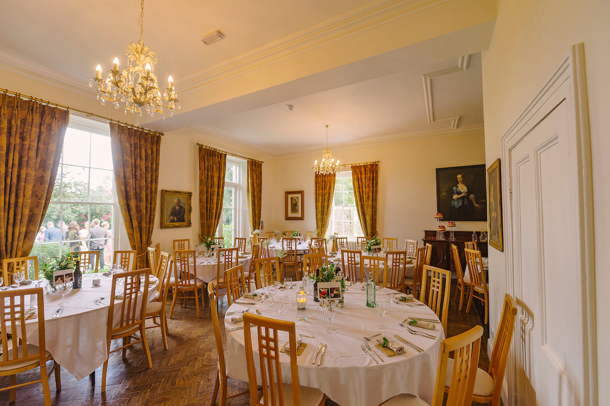 Dining-Room-wedding-breakfast-round-tables-with-cloths - Hallsannery